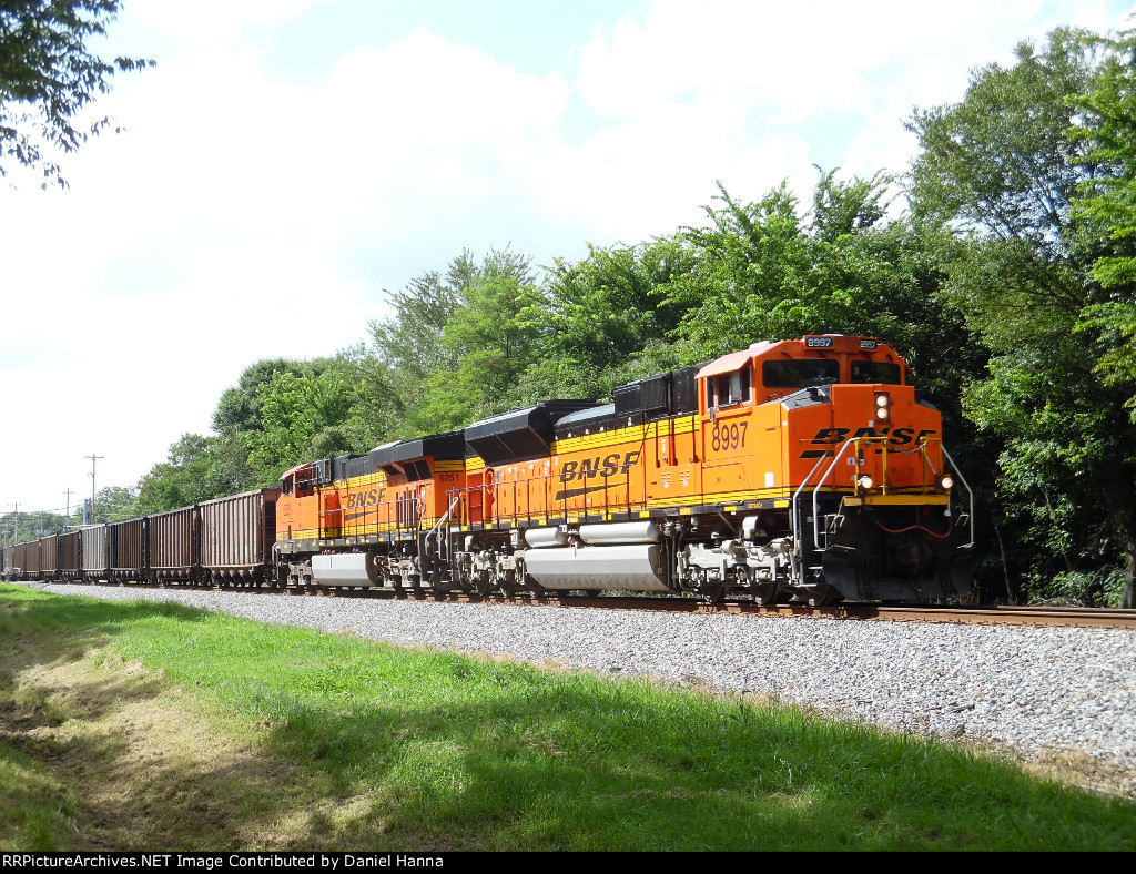 A sharp looking BNSF 'ACe leads this coal train